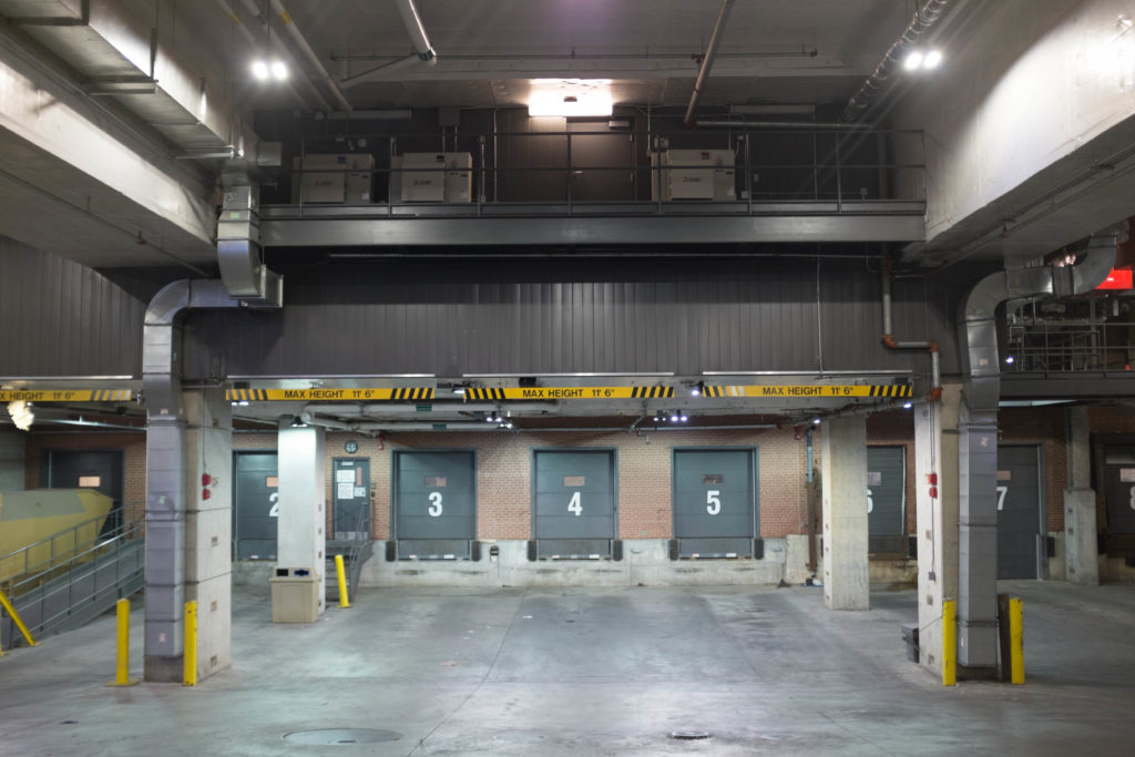 Hospital loading dock – a sibilant intake of breath