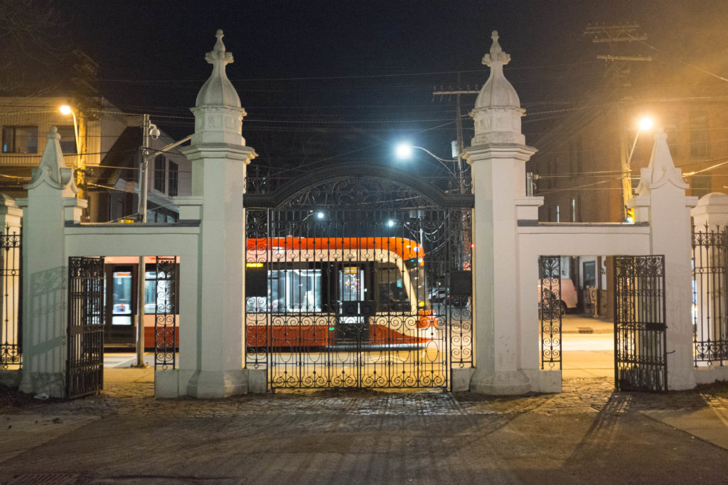 Trinity Bellwoods park gate and streetcar – a sibilant intake of breath